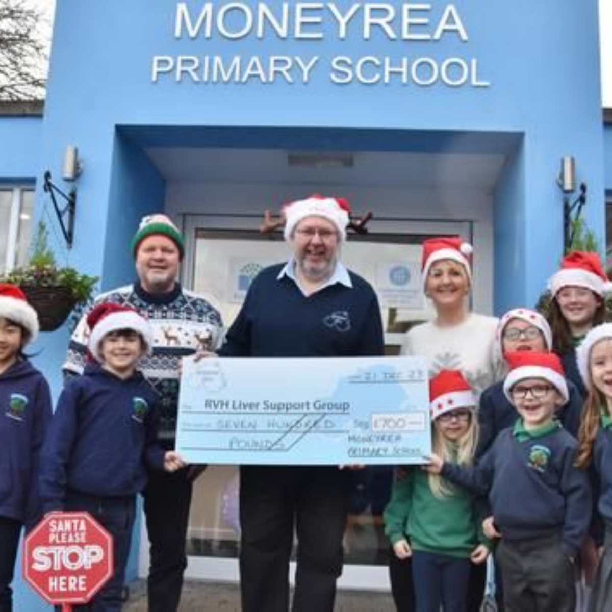 Moneyrea Primary School and Nursery - Moneyrea Present a Cheque